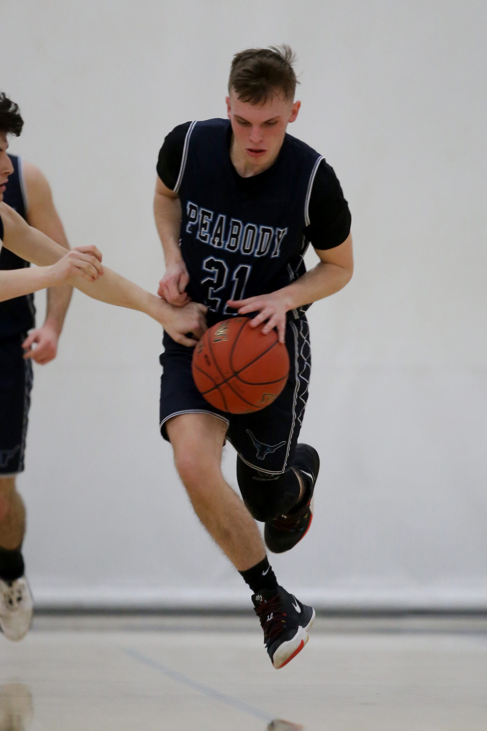 Peabody boys basketball punches tournament ticket with win over Big ...